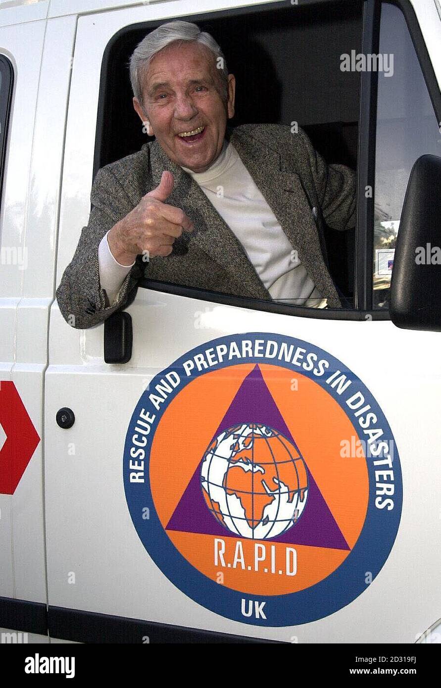 Veteran comic Sir Norman Wisdom sat in the front seat of a seventeen ...