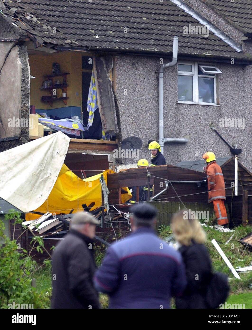 Firemen at the scene of a house blast in Batley, near Leeds, in which ...
