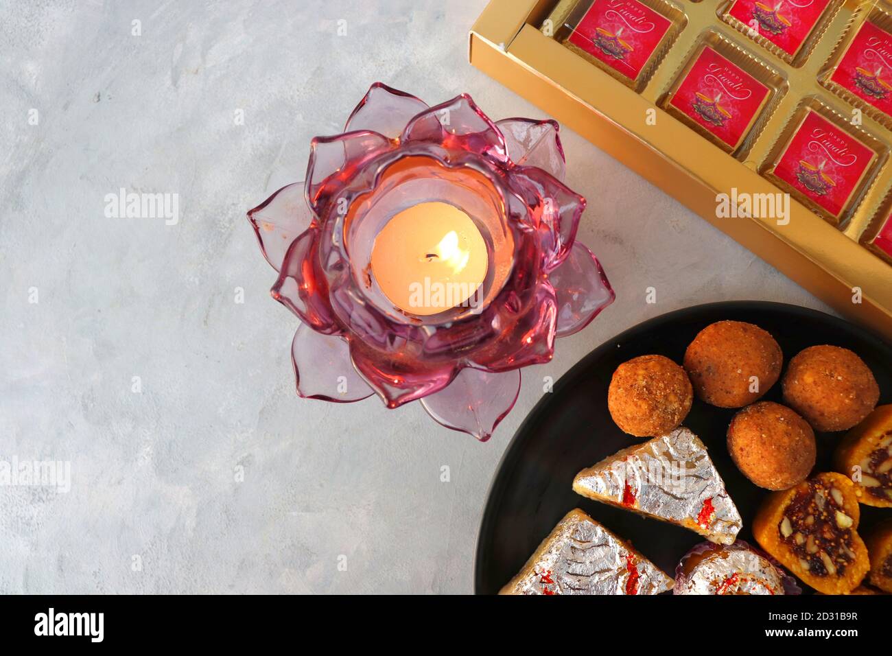 Assorted Indian sweets or Mithai, Rava laddoo, Besan laddu, dry fruits ...