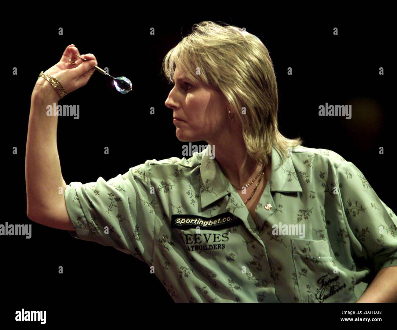 Trina Gulliver throw's from at the oche during The first Womens World ...