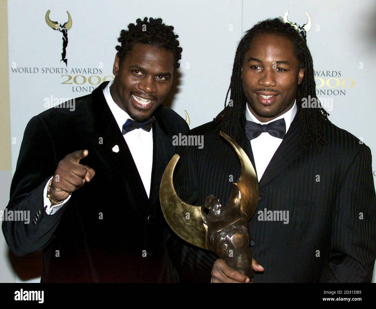 World Heavyweight Boxing Champion Lennox Lewis (right) with Olympic ...