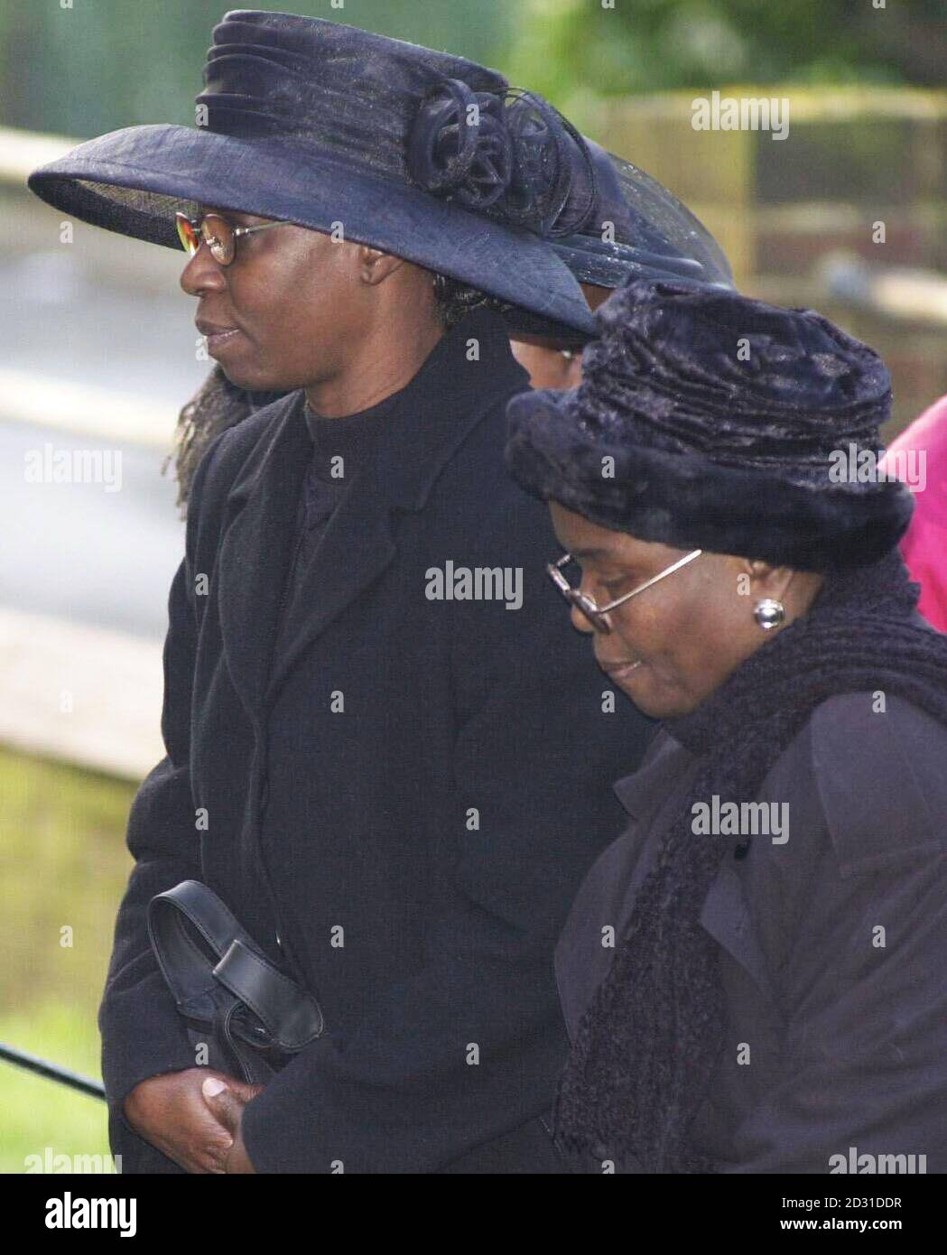 Gloria Taylor, left, arrives, with a friend at All Saints Church in ...