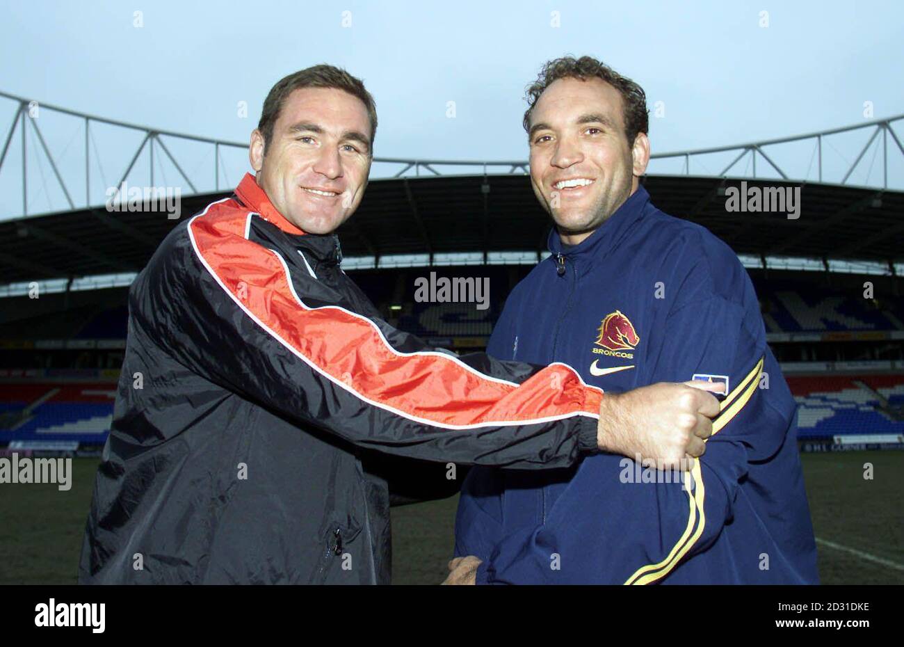 St Helens's David Fairleigh (left) and Brisbane's Gordan Tallis square ...