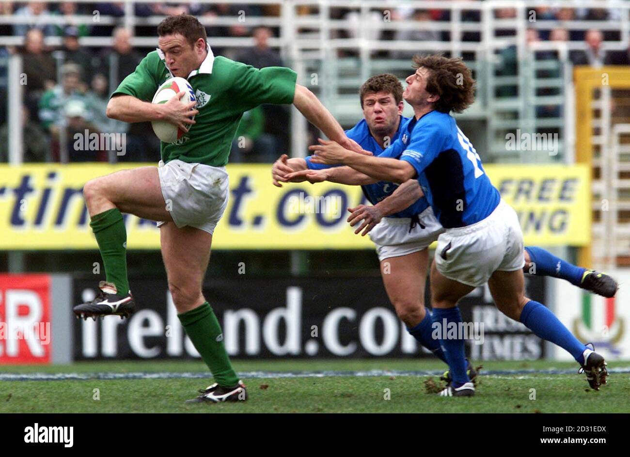 Ireland's Rob Henderson (left) breaks past the Italian defence to go on ...