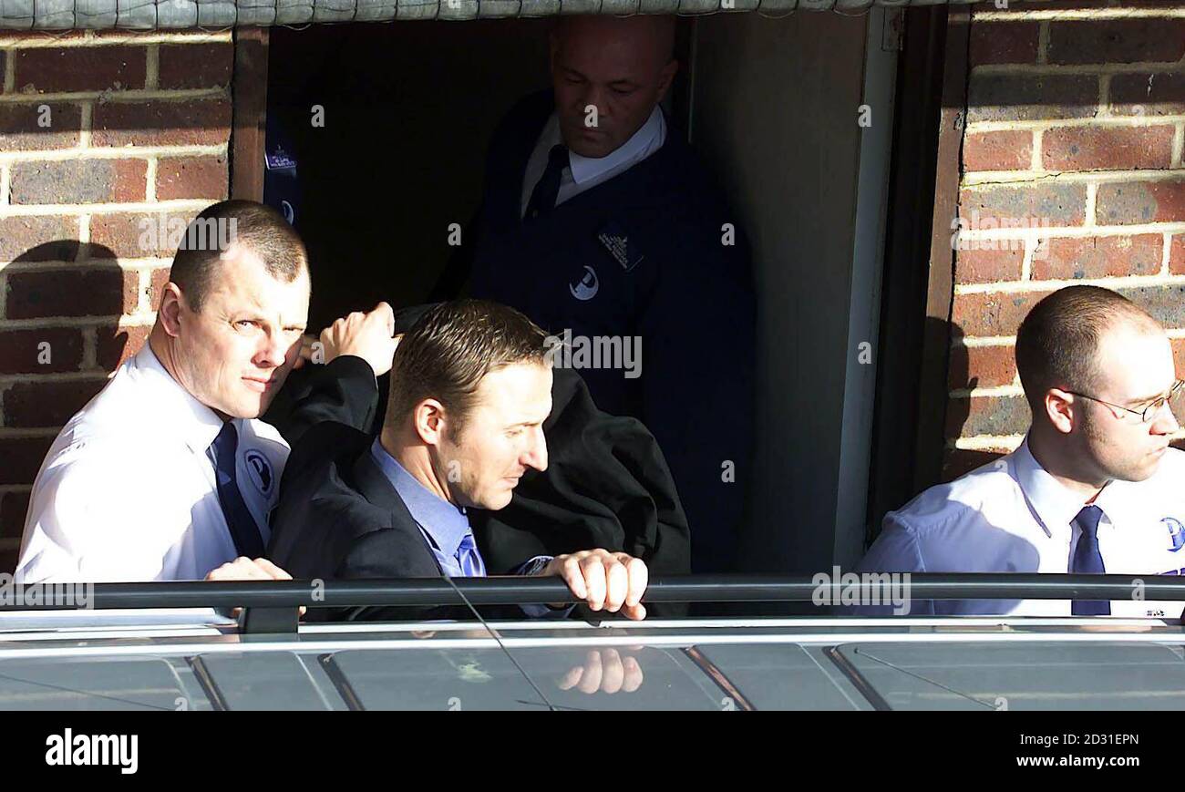 Roy Whiting Under Blanket Is Escorted By Guards As He Leaves