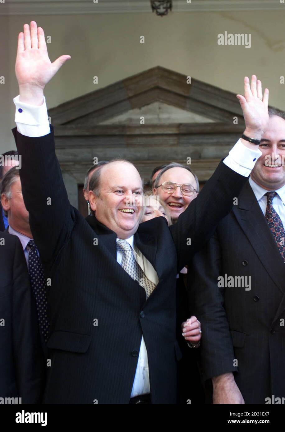 Michael Noonan celebrates at Leinster House, in Dublin, after being ...