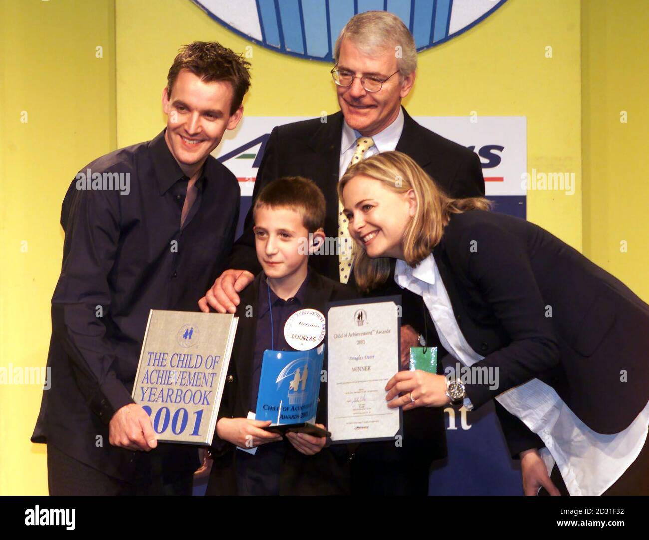 Douglas Dunn, 9, from Avon, receiving a Child of Achievement Award, in ...