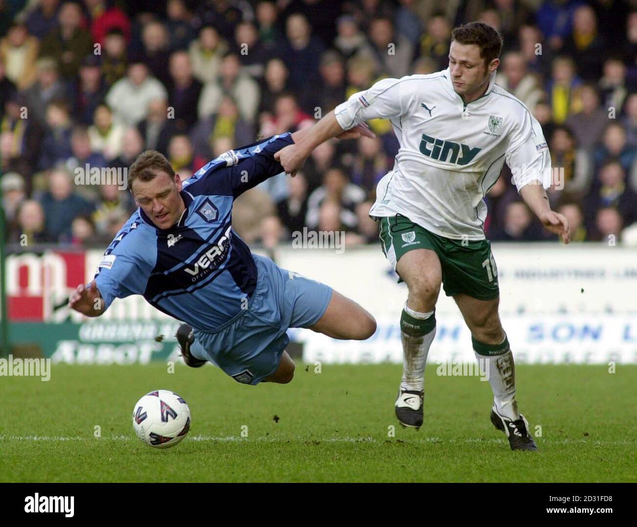 Football action colliding falling hi-res stock photography and images ...