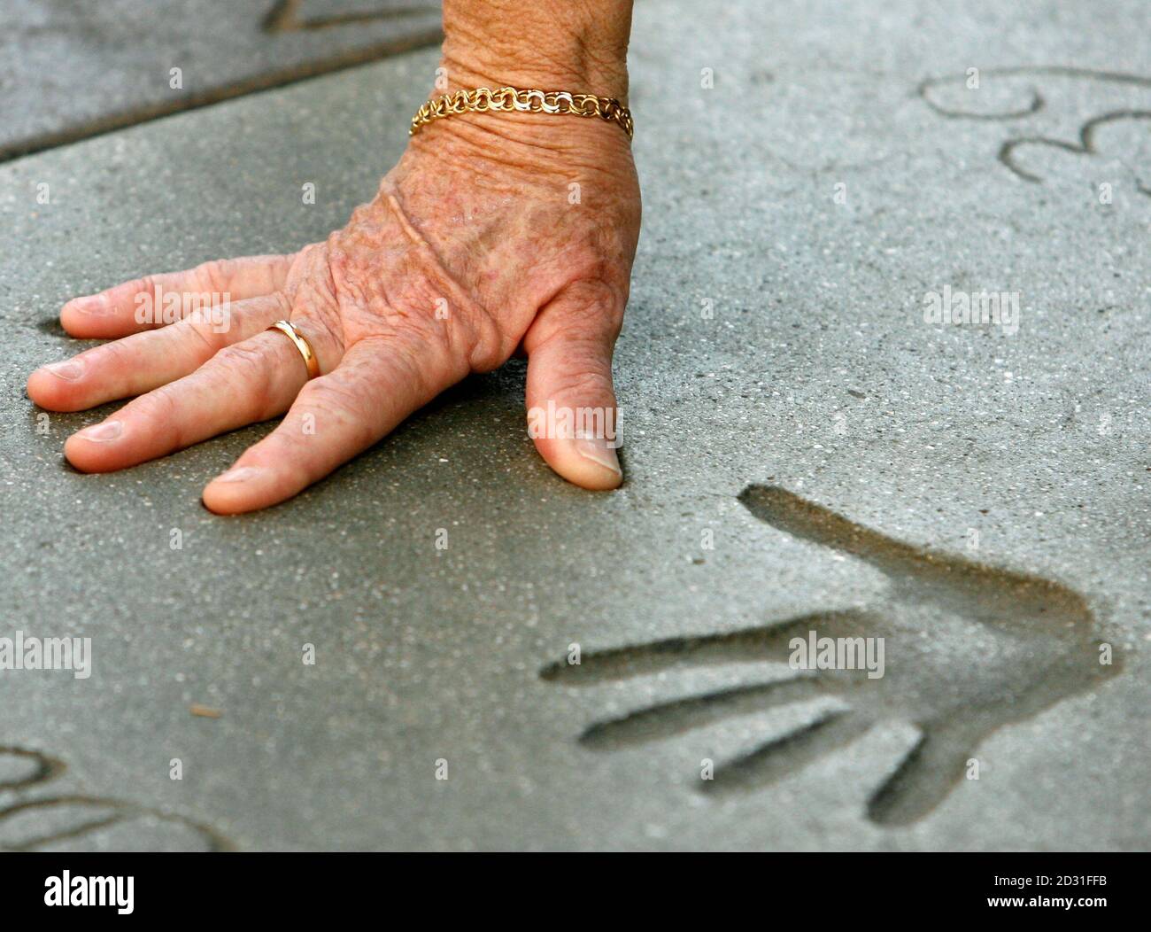 Hand print in concrete hi-res stock photography and images - Alamy