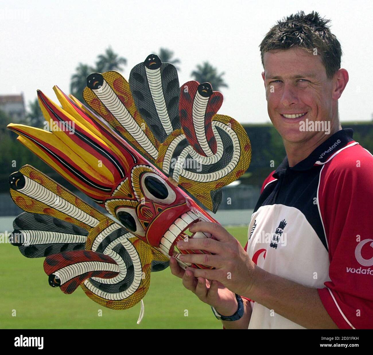 England spin bowler Ashley Giles with a local Sri Lankan mask in Galle ...