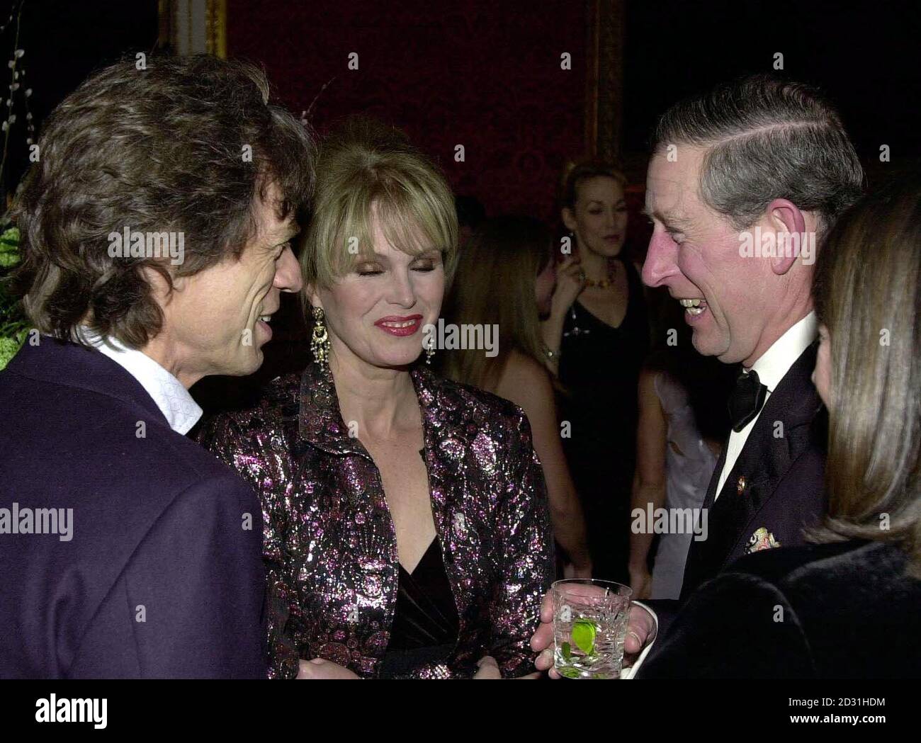 The Prince of Wales (R) enjoys a joke with Rolling Stones singer Mick ...