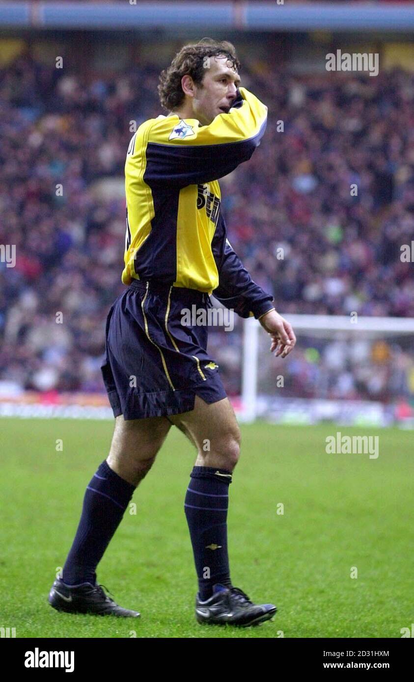 Arsenal's Gilles Grimandi walks off the pitch, after being shown the ...