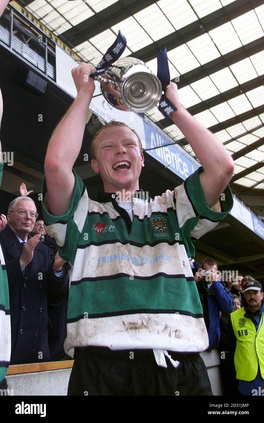 Stuart Lock lifts the trophy of the University of Exeter after the ...