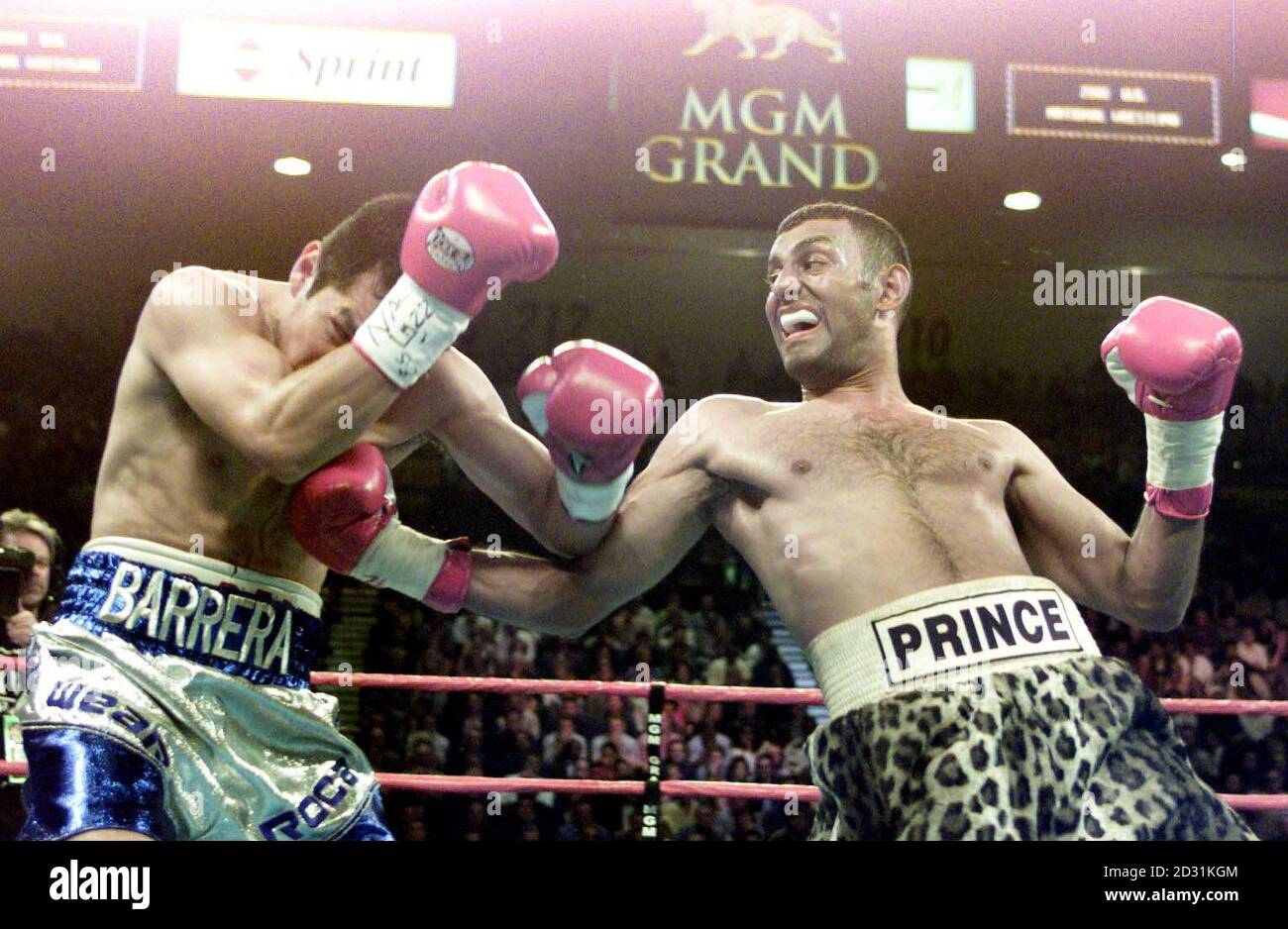Prince Naseem Hamed (right) gets a good right body punch in on Marco ...