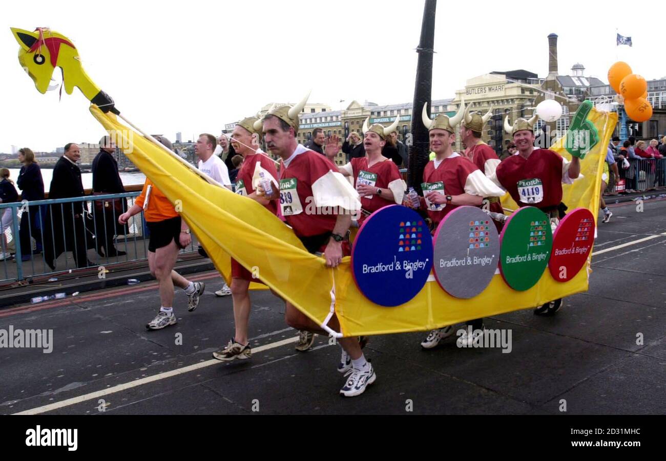 Competitors dressed as vikings pass over Tower Bridge in the 21st ...