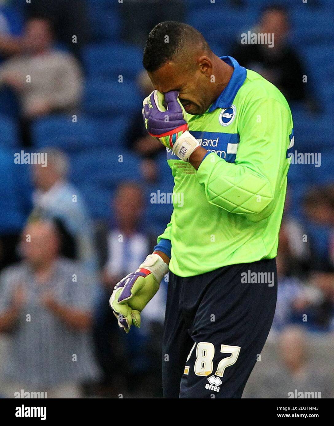 Brighton's Michel Kuipers is emotional as he leaves the field during a ...