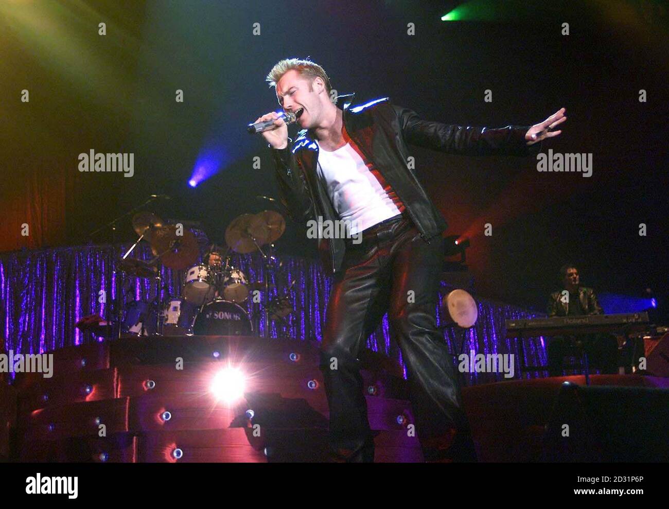 Pop star performing celebrity music on stage singing microphone hi-res ...