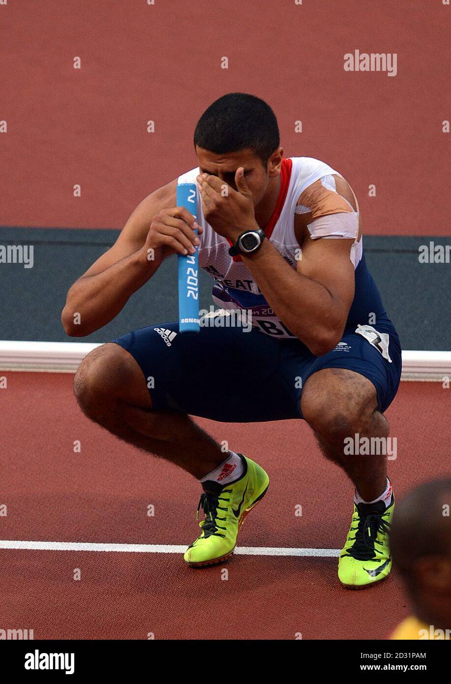 Great Britain's Adam Gemili reacts after crossing the line in the mens ...