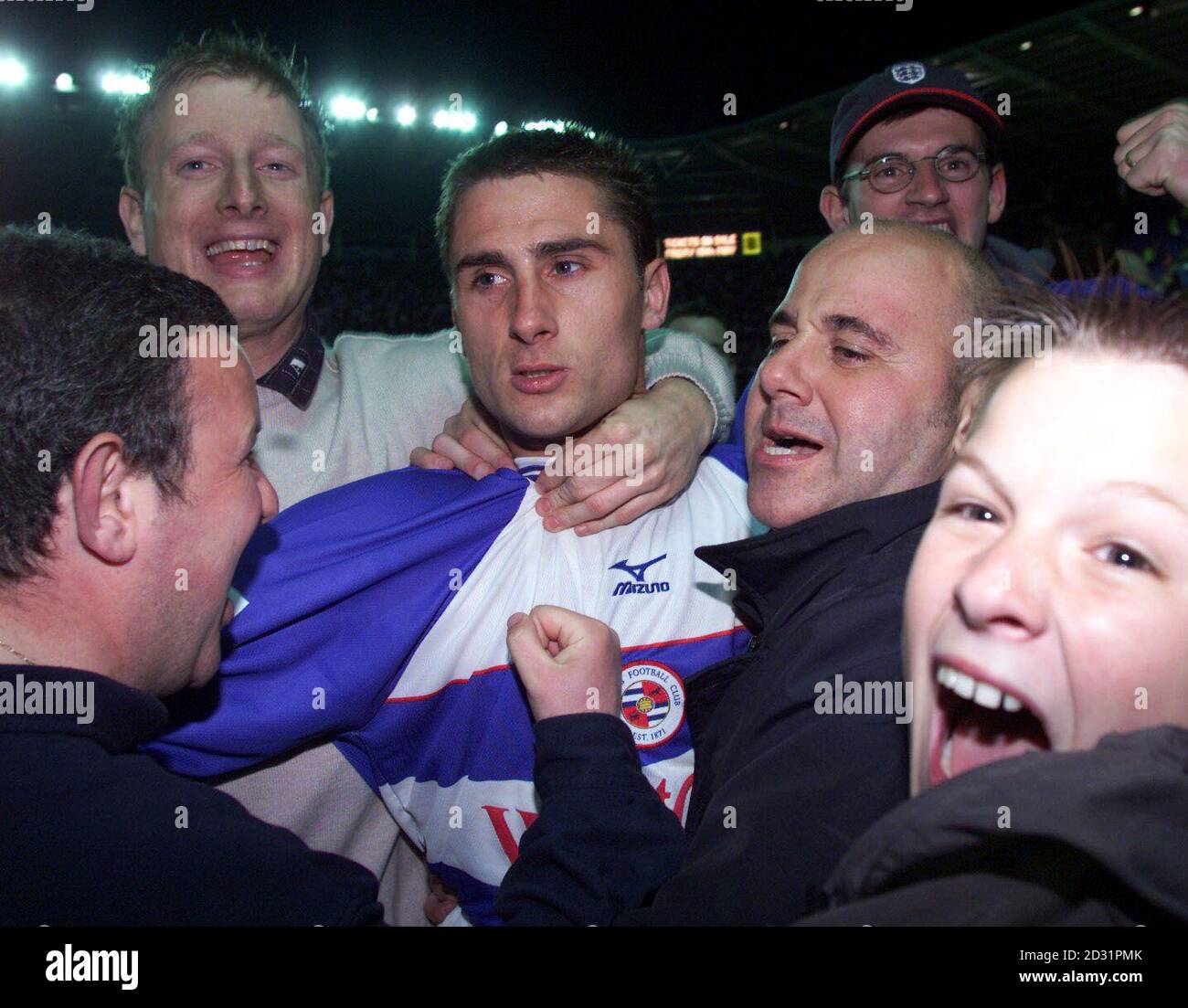 Nicky Forster celebrates with Reading supporters after scoring a last ...