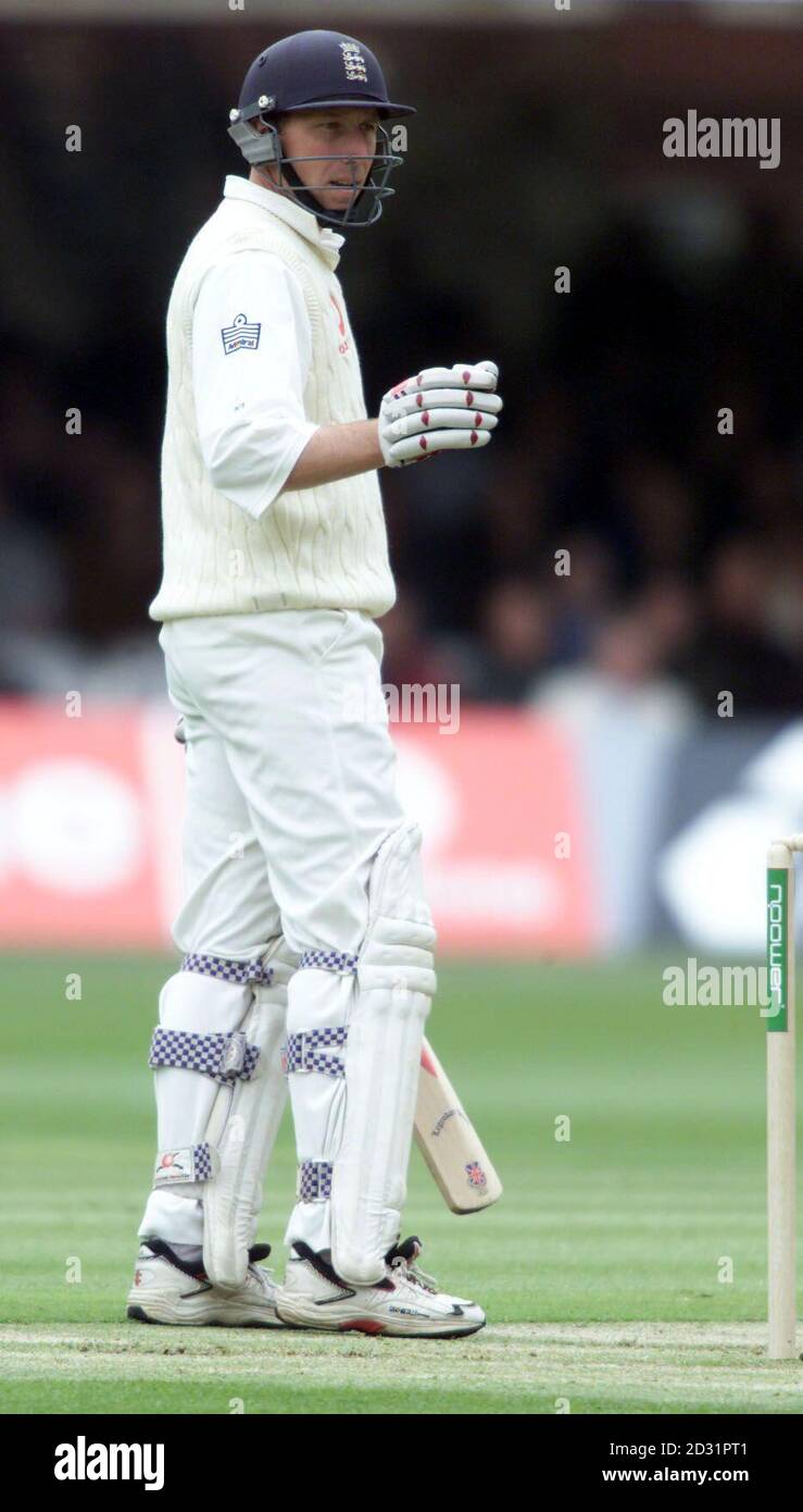 England's Mike Atherton checks the field before facing a ball from ...