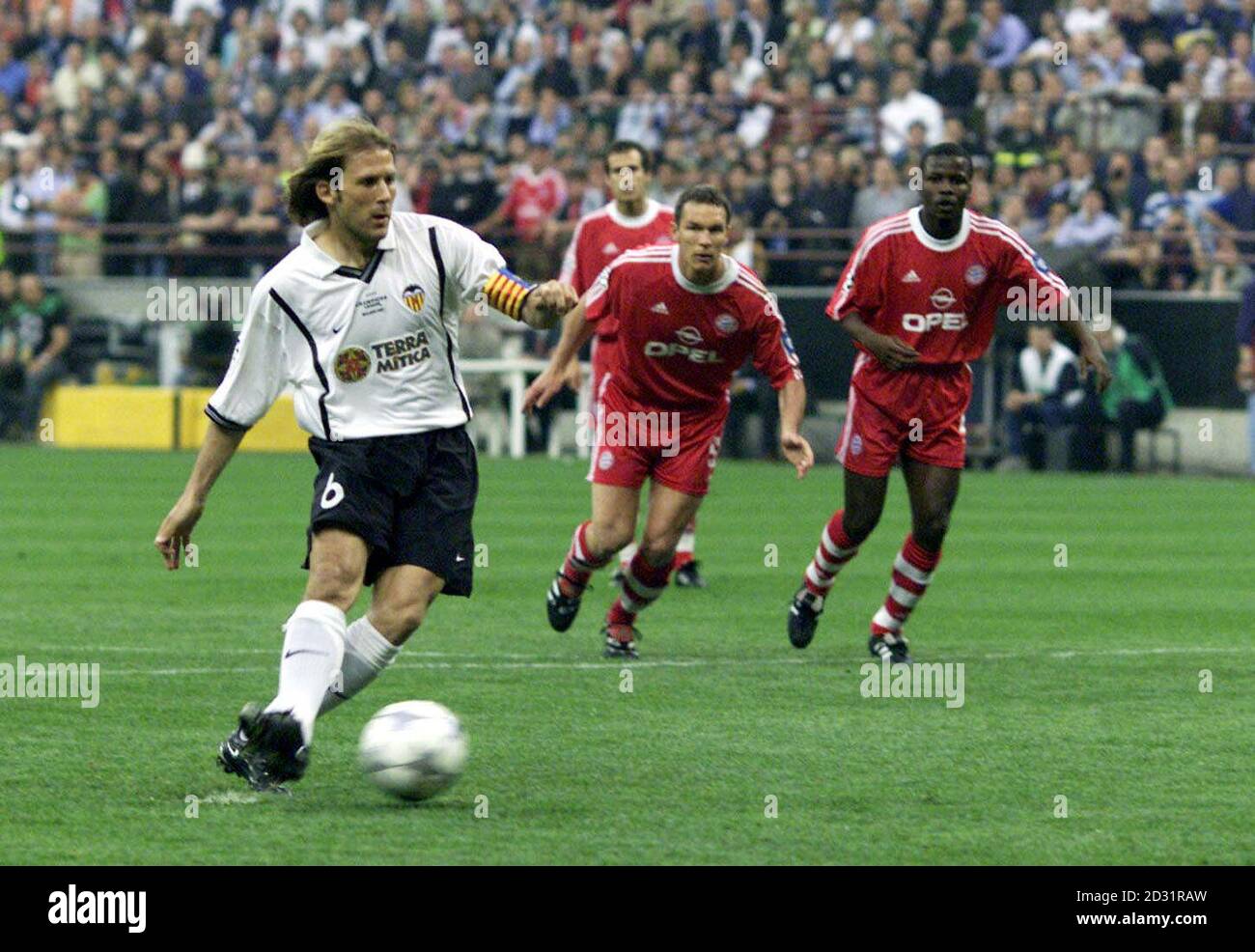 Valencia's Gaizka Mendieta (left) scores the penalty for the first goal ...