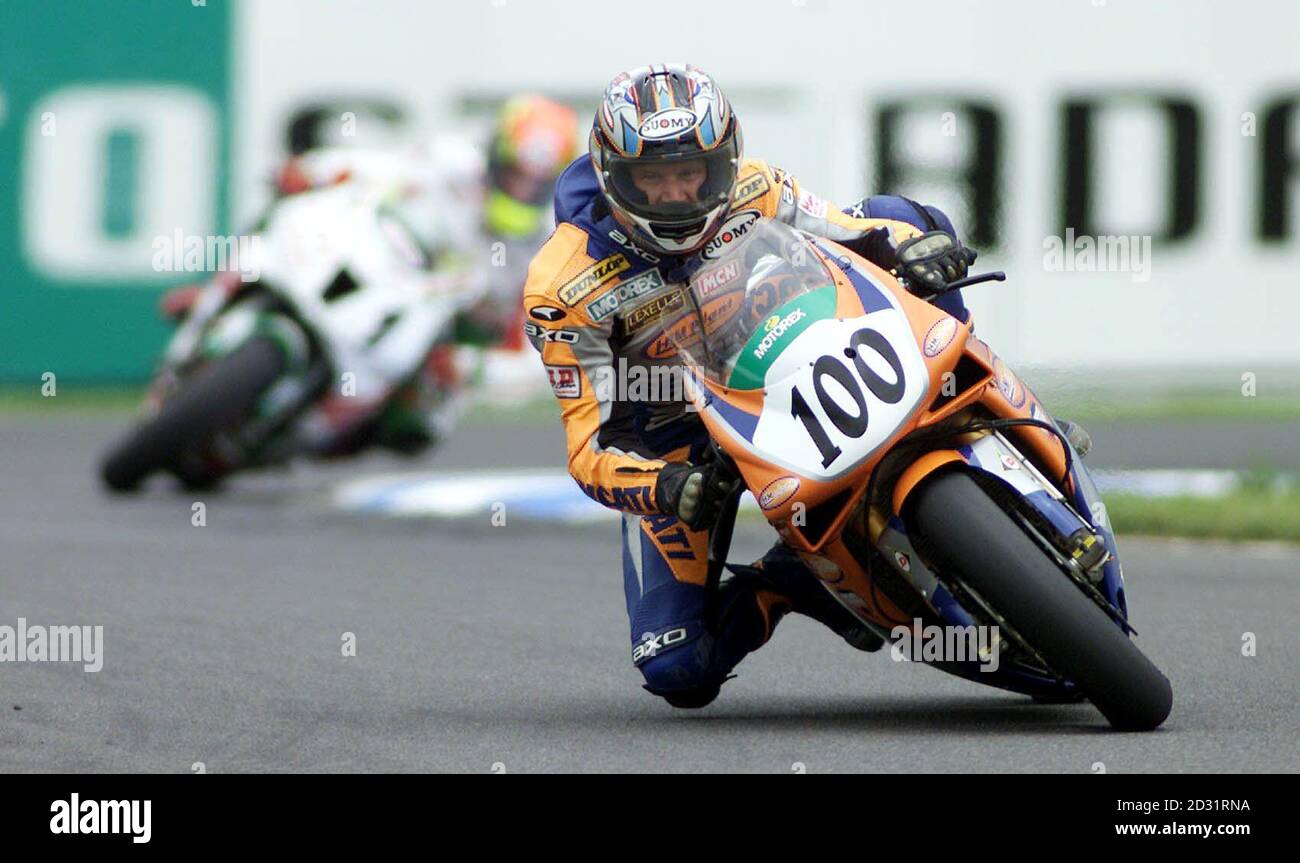 Neil Hodgson leads ahead of Colin Edwards, in race one of the fifth ...