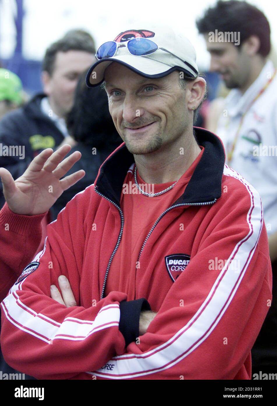 Former record world champion Carl Fogarty watches the fifth round of ...