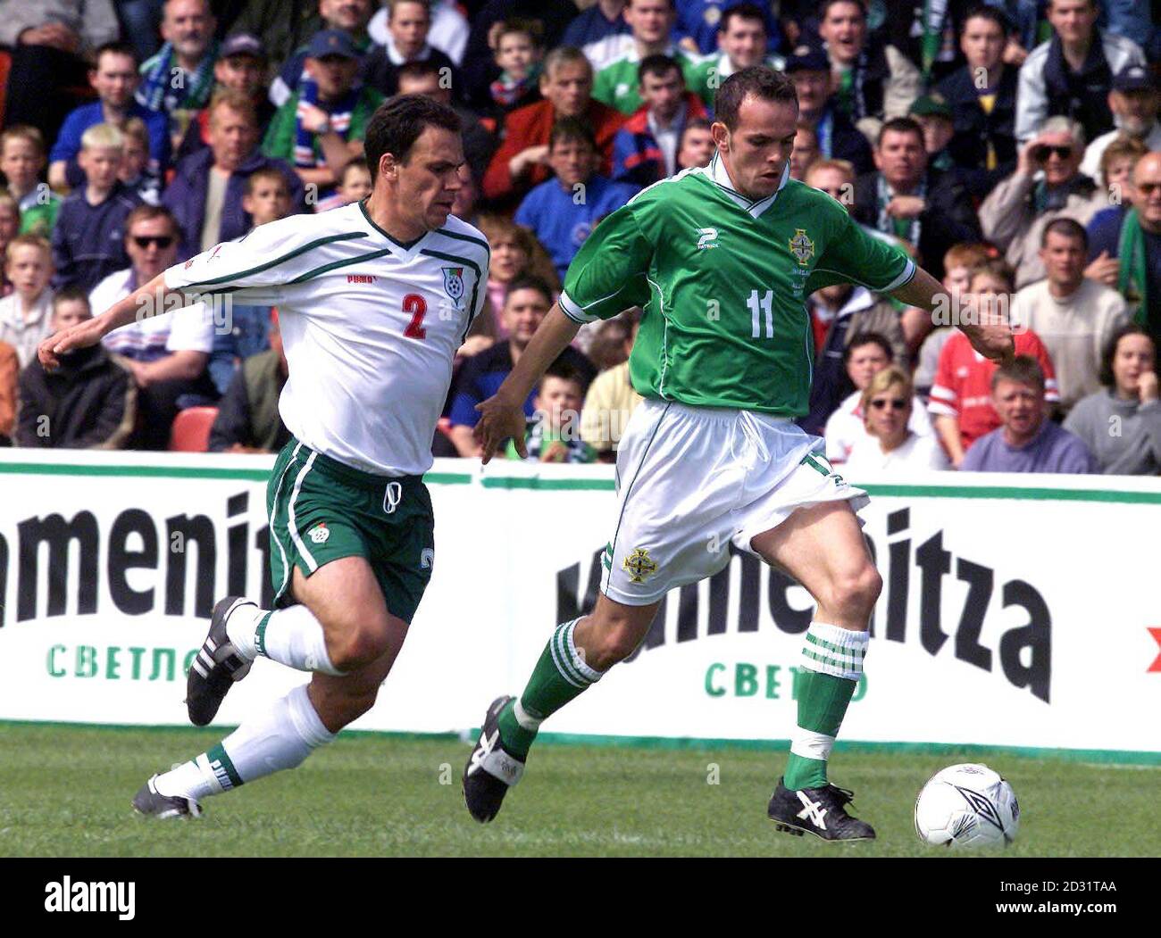 Northern Ireland's Stuart Elliott (right) breaks free from Bulgaria's ...