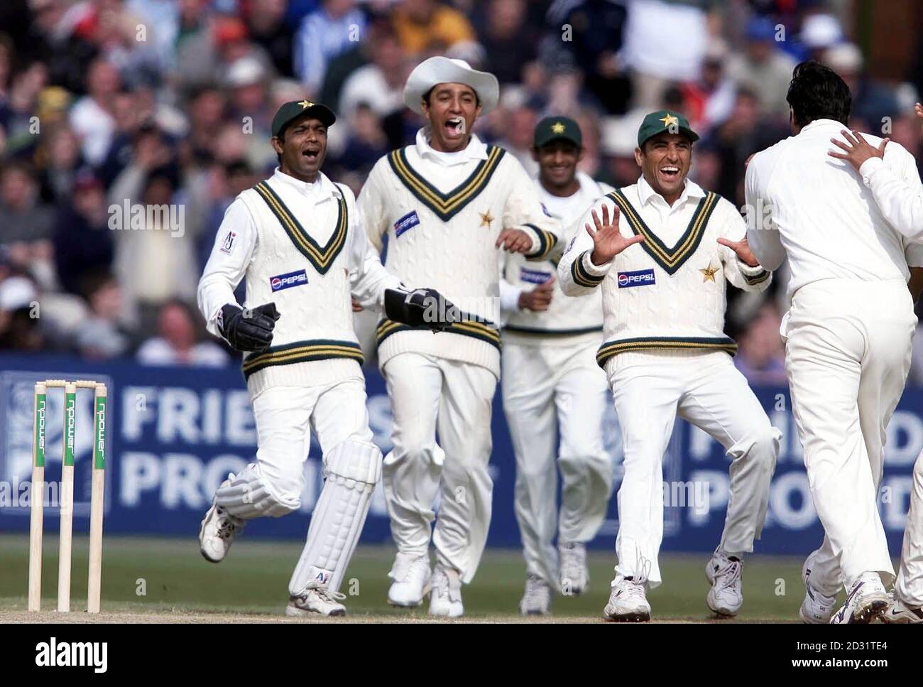 Pakistan players rush to congratulate Wasim Akram after he trapped ...