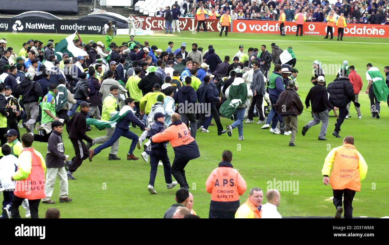 England Cricket players are trapped after a pitch invasion stopped play ...