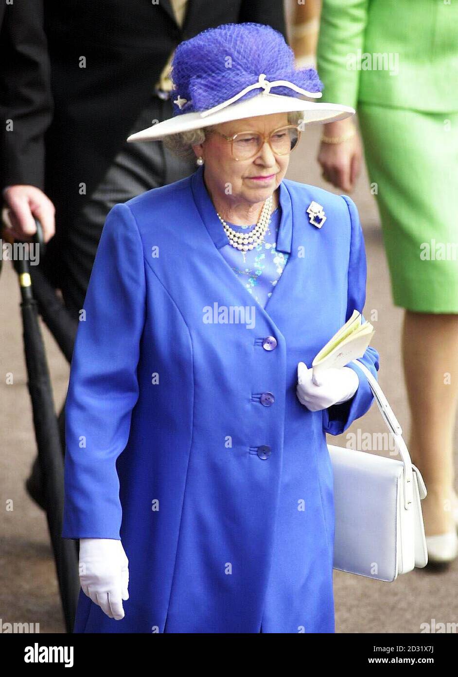 Queen Elizabeth II walks through the Royal Enclosure on the fourth day ...