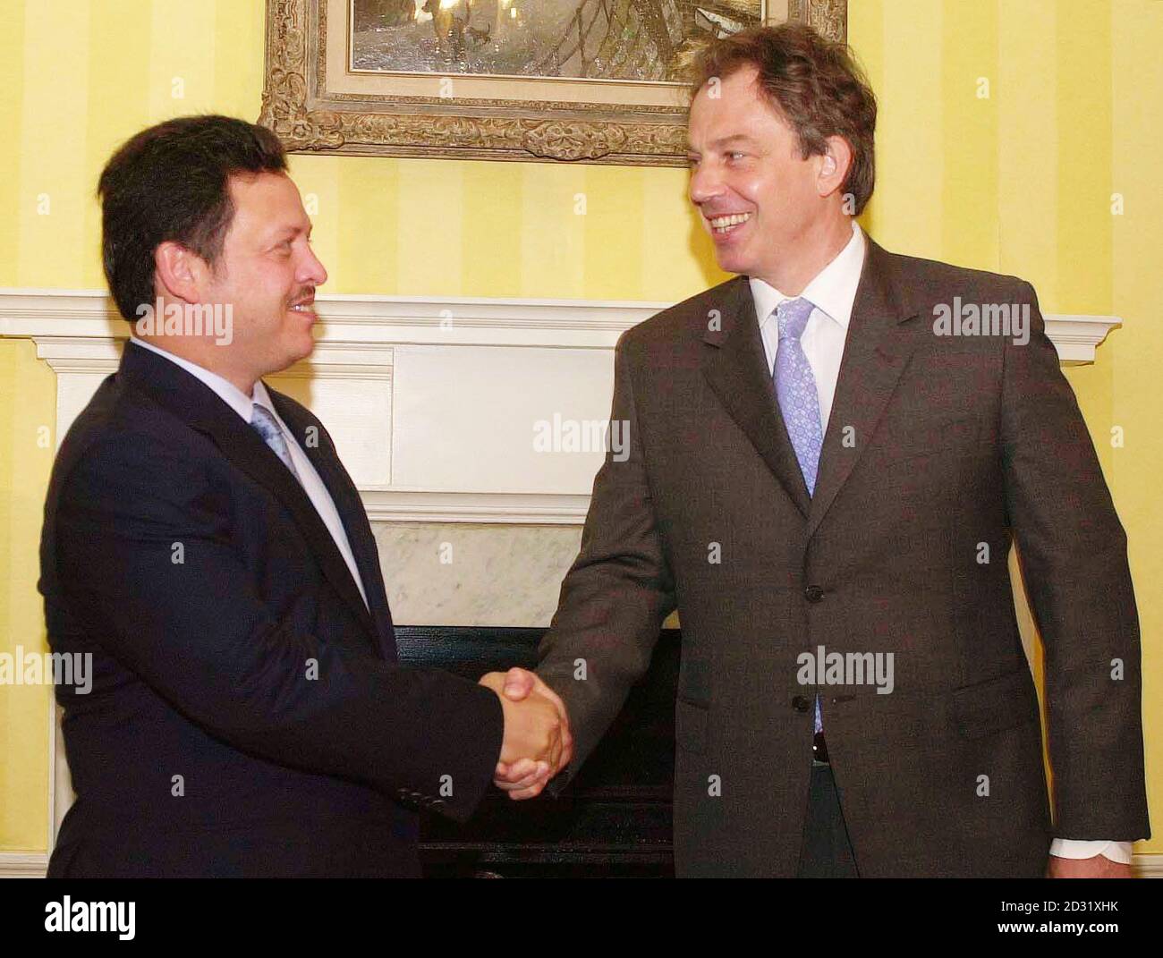 Prime Minister Tony Blair (right) shakes the hand of King Abdullah of ...