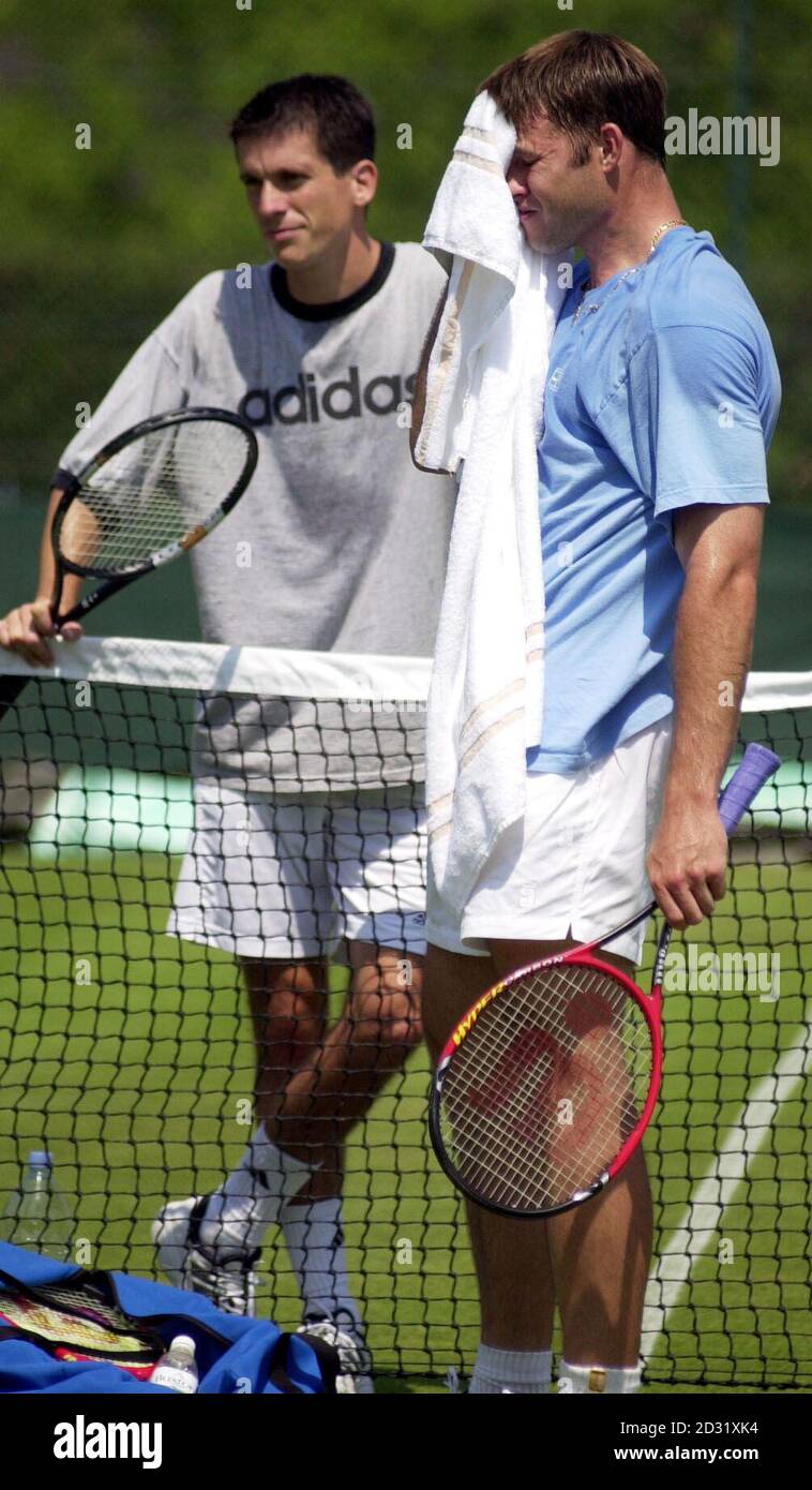 NO COMMERCIAL USE : Great Britain's Tim Henman (left) and fellow ...