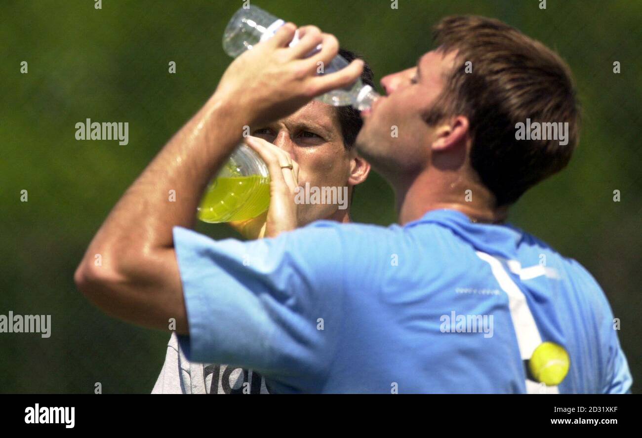 Great Britain's Tim Henman (rear) and fellow countryman Barry Cowen on ...