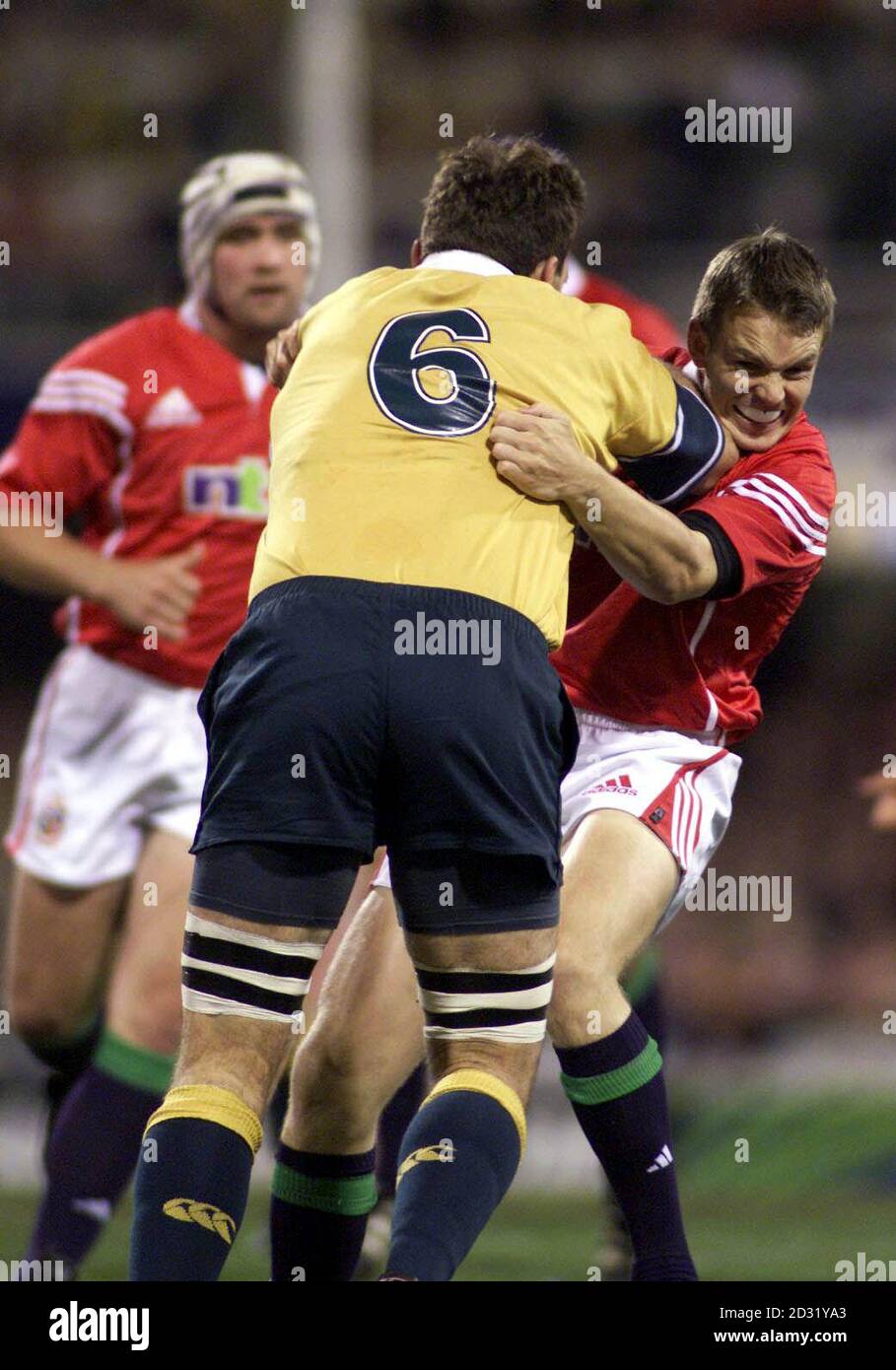 British and Irish Lions player Matt Perry (right) tackles Australia's ...