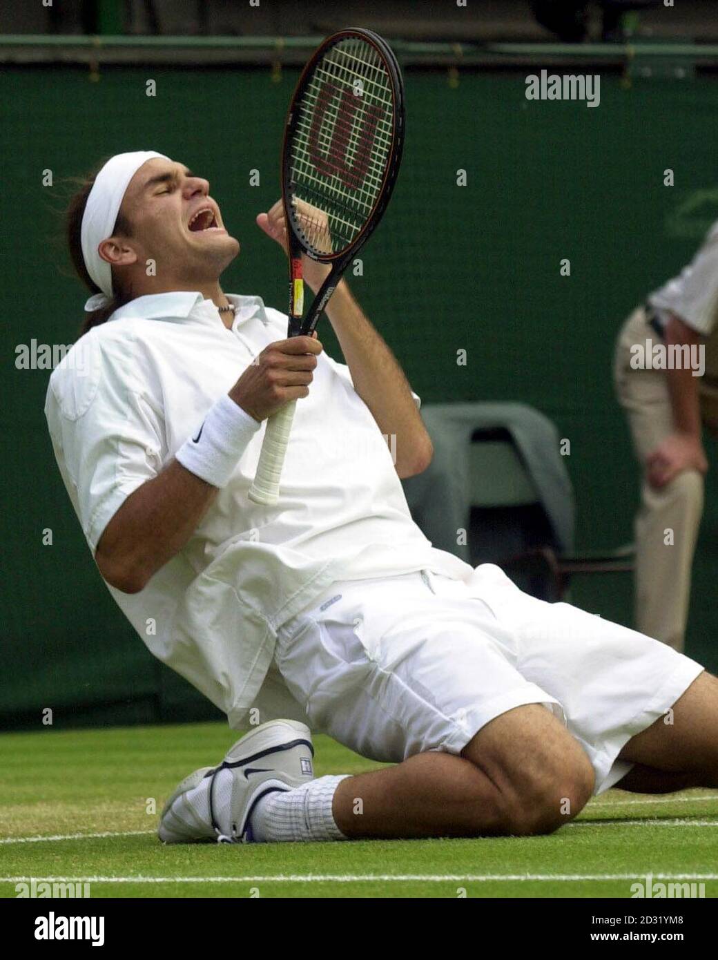 NO COMMERCIAL USE: Switzerland's Roger Federer celebrates his five set ...
