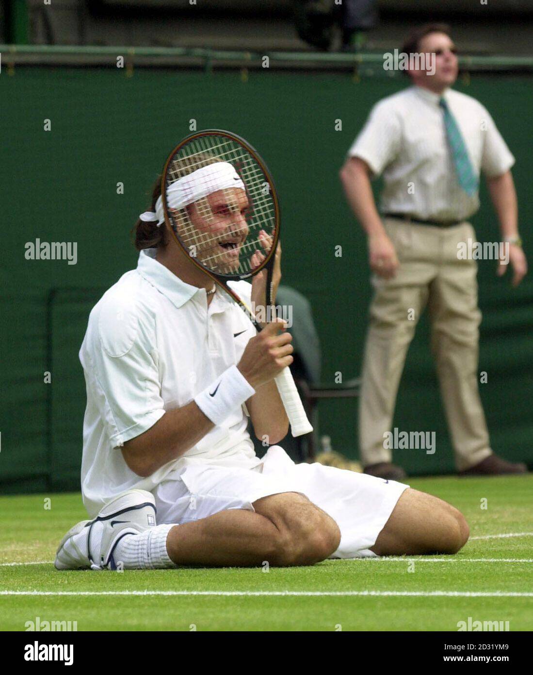 Switzerland's Roger Federer celebrates his victory over USA's Pete ...