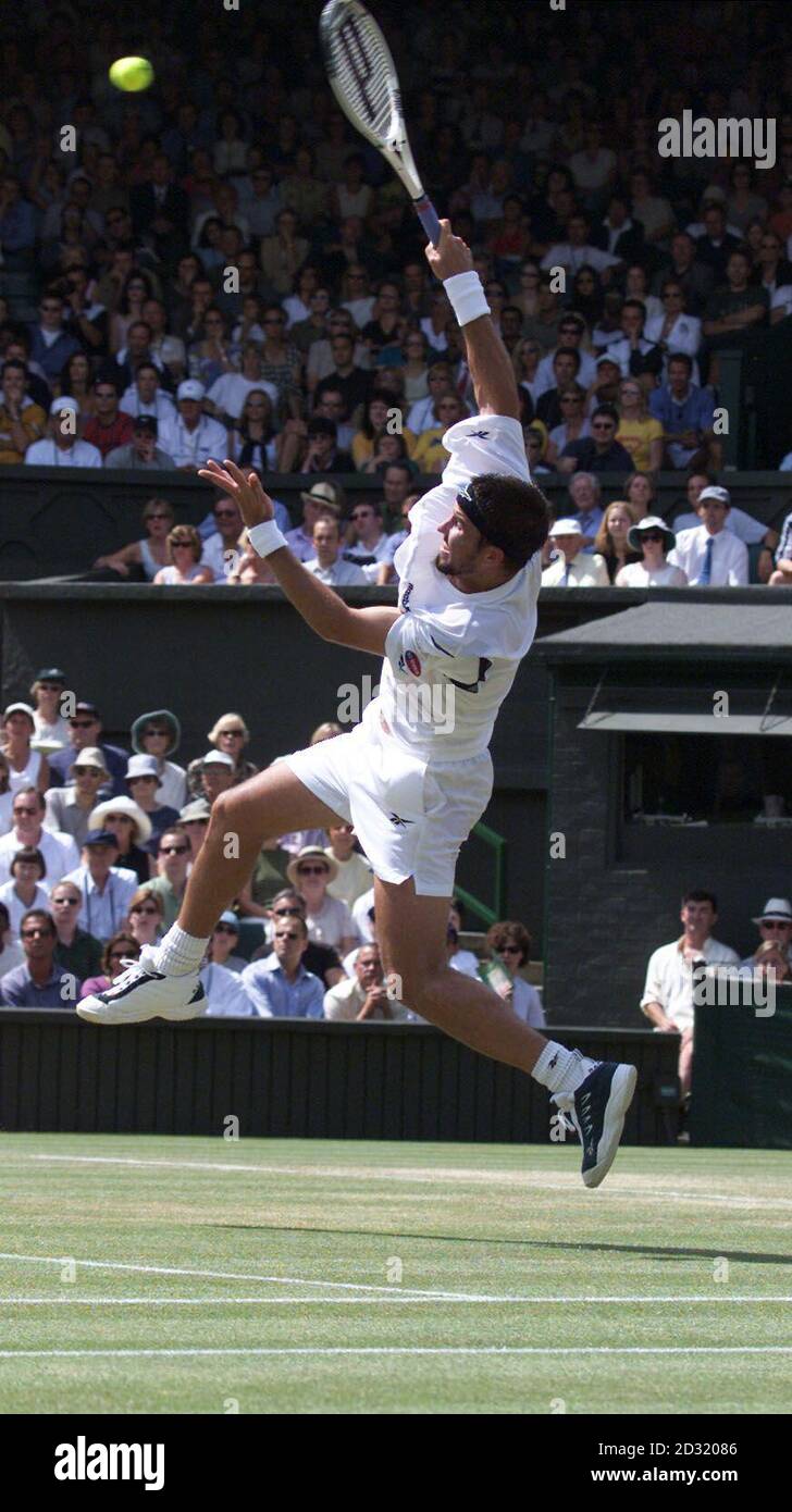 NO COMMERCIAL USE: Australia's Pat Rafter leaps for a volley during his ...