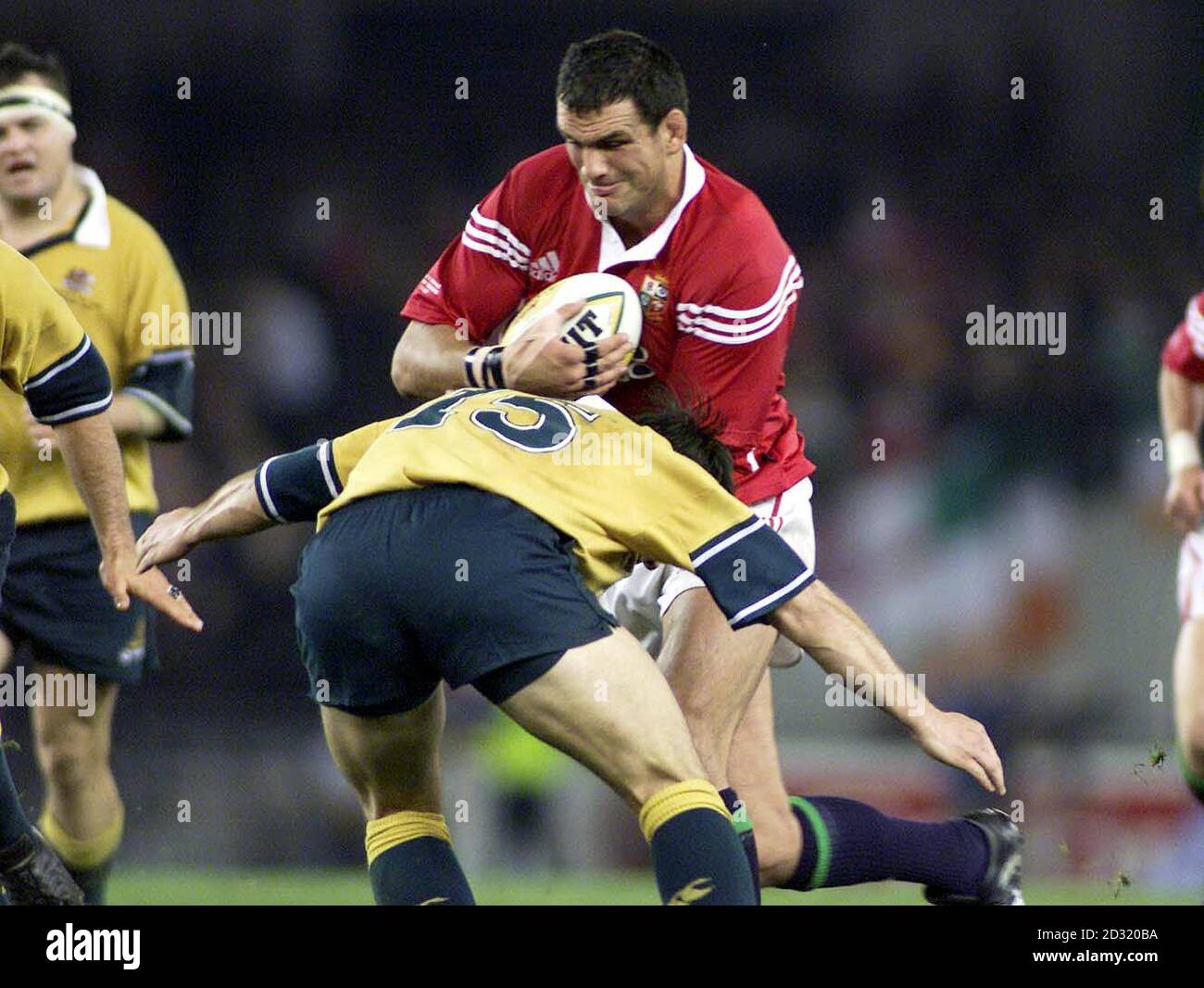 British and Irish Lions captain Martin Johnson powers through the ...