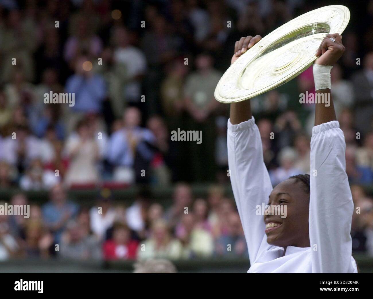 NO COMMERCIAL USE: USA's Venus Williams celebrates with the trophy ...