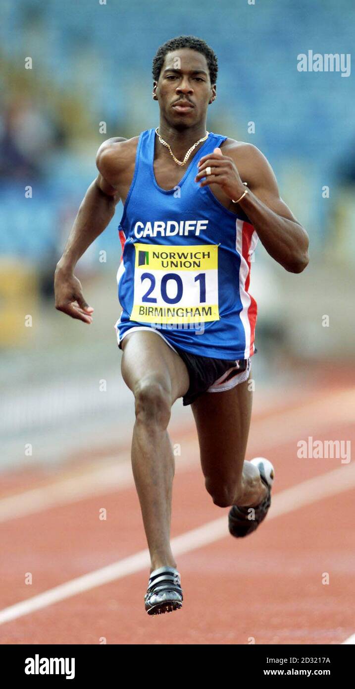 Christian Malcolm during his 100m heat in the Norwich Union World ...