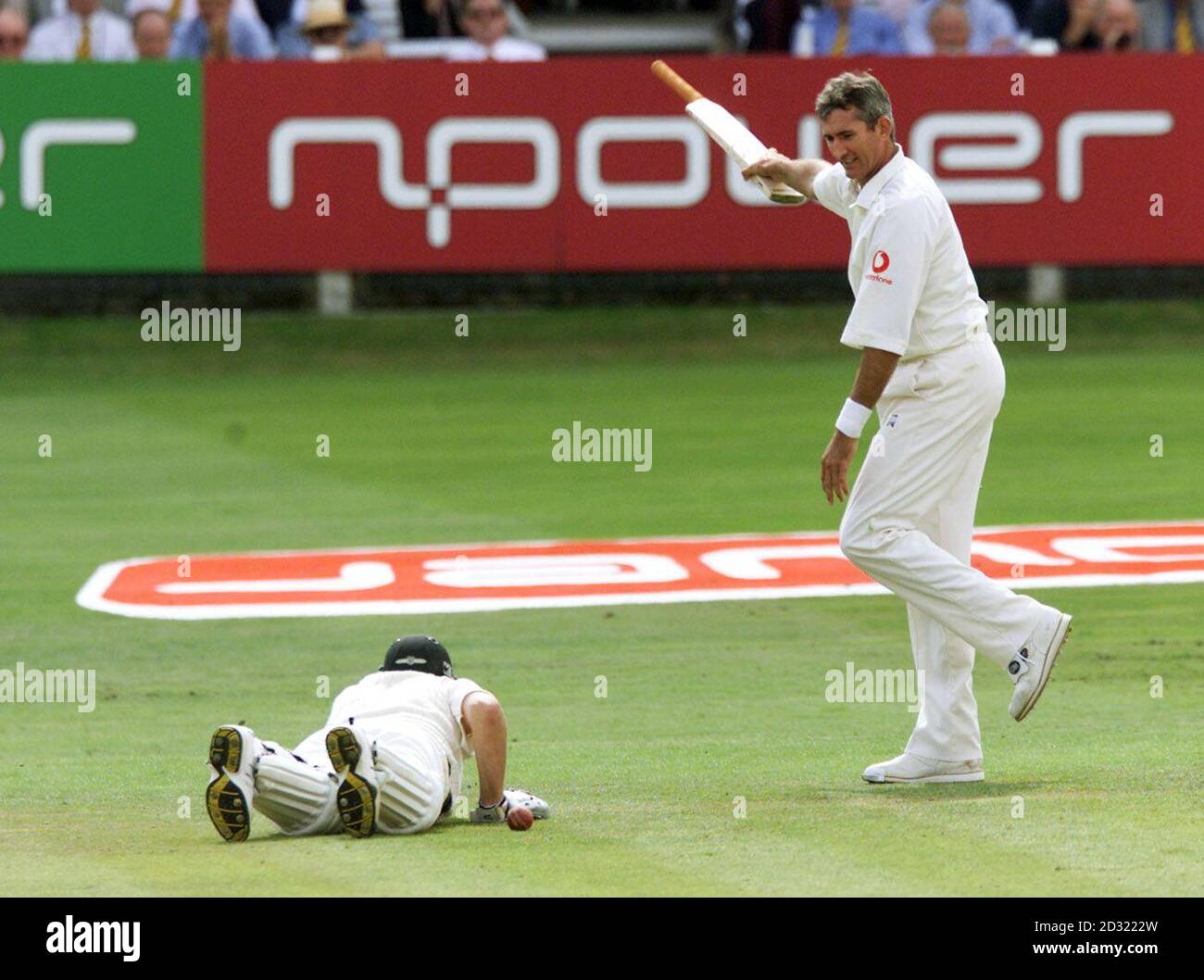 Australia's Mark Waugh is almost run out, as England's Andrew Caddick ...