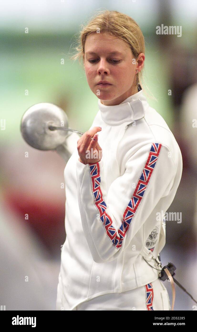 Olympic gold medalist Stephanie Cook checks her foil before the fencing ...
