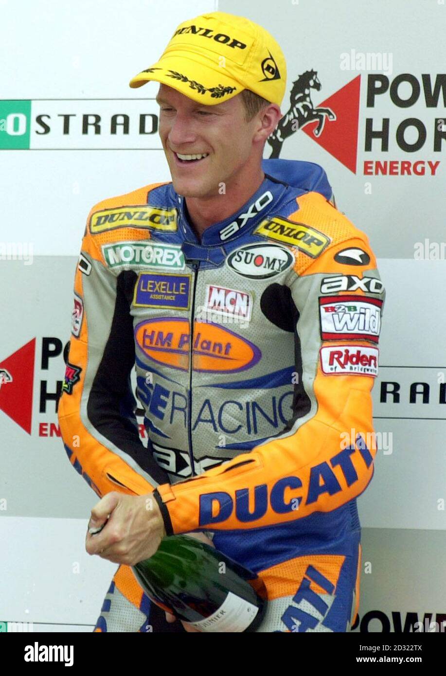 Great Britain's Neil Hodgson celebrates on the podium after finishing ...