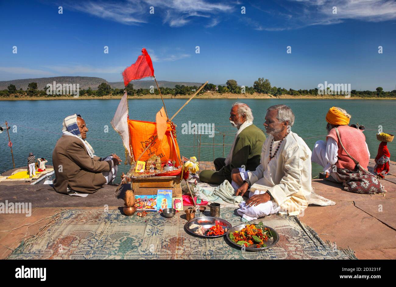 Hoshangabad, 21,January ,2010 : Pandit using political party BJP flag ...