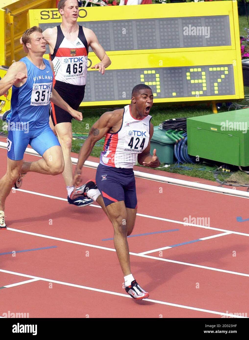 Great Britain's Mark Lewis Francis (right) shows his delight at a time ...