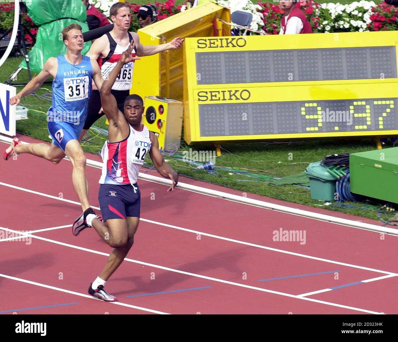 Great Britain's Mark Lewis Francis (right) shows his delight at a time ...