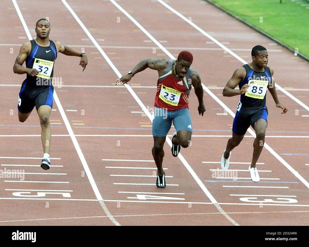 Usas tim montgomery in action hi-res stock photography and images - Alamy