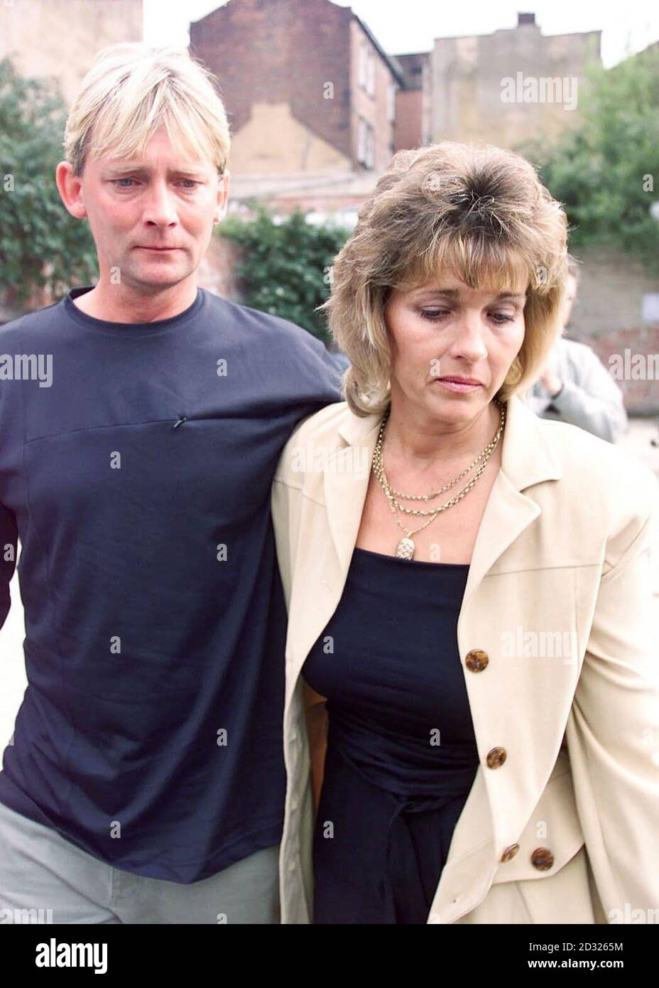 Painter and decorator, Howard Walmsley, 43, and his wife Kathy arrive ...