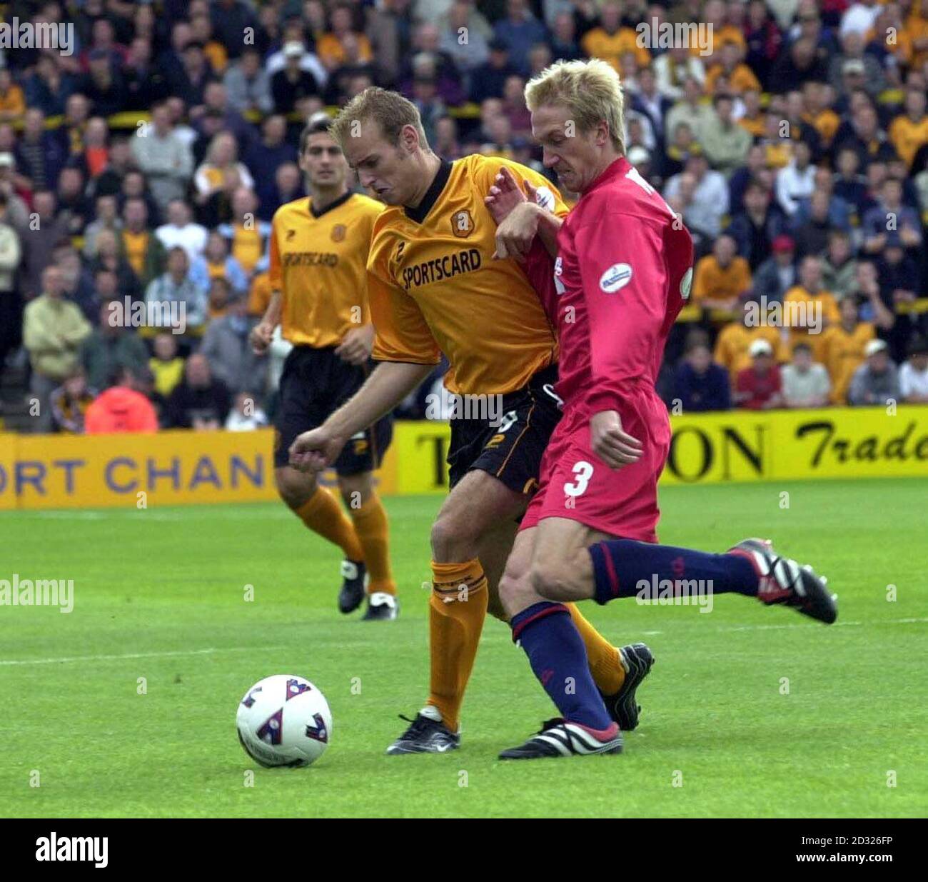 Hull City's Gary Alexander (left) tussles with York City's Graham ...